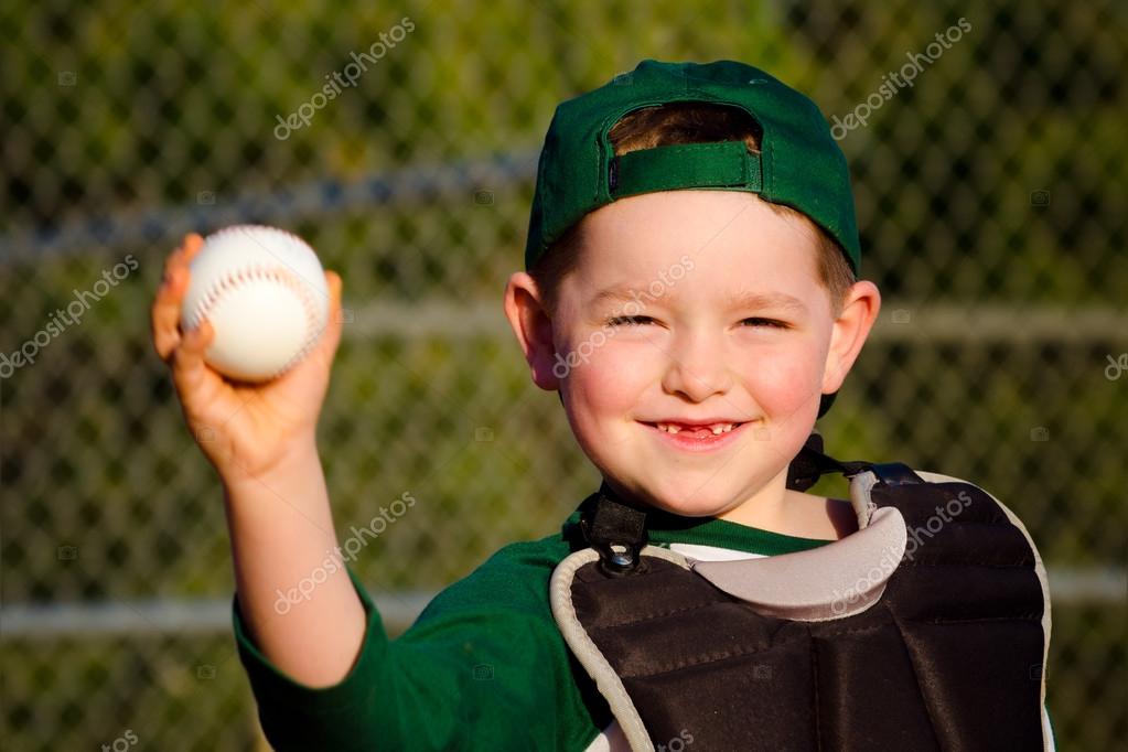 Young child in catcher s gear throwing baseball — Stock Photo ...