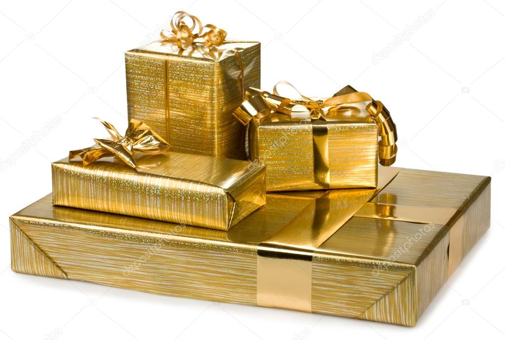 Golden gift boxes with gold ribbon — Stock Photo © Andrewsht #14565533