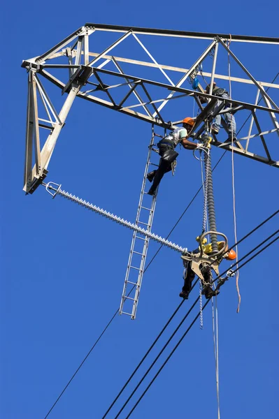 Maintenance of a power line Stock Photo by ©Fotografiche 46467795