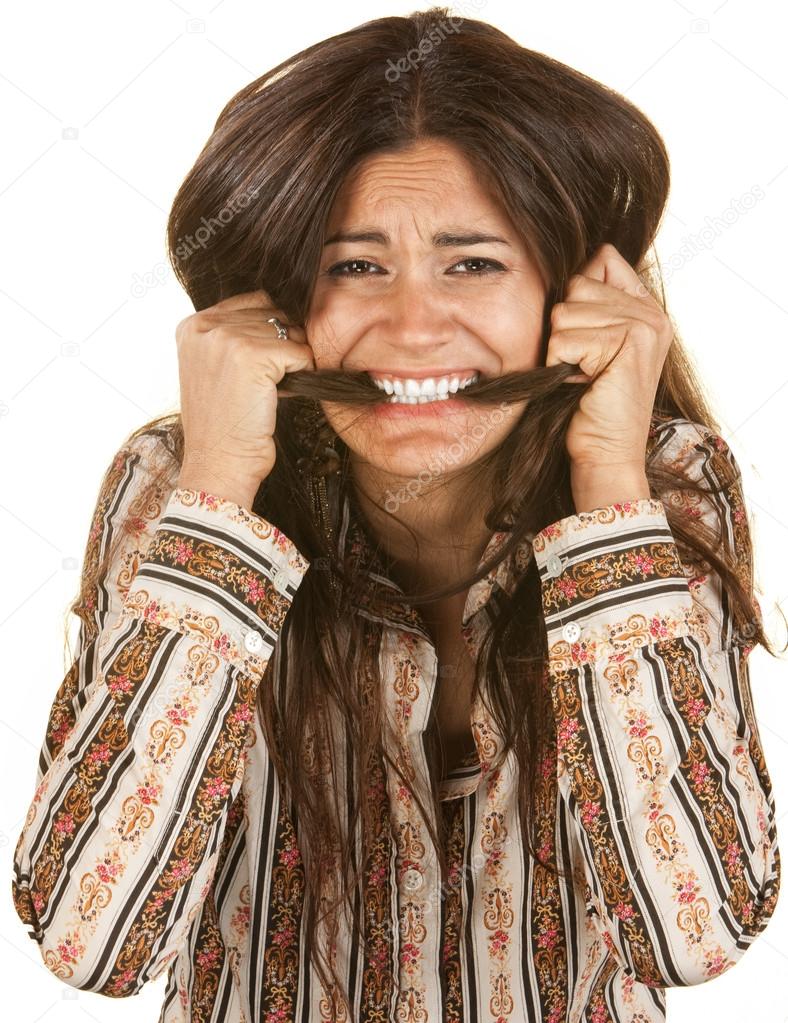 Frantic Woman Biting Her Hair — Stock Photo © creatista #12310262