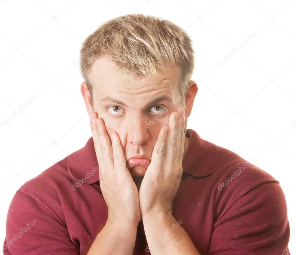 Sad Man Pulling on Face Stock Photo by ©creatista 16944125