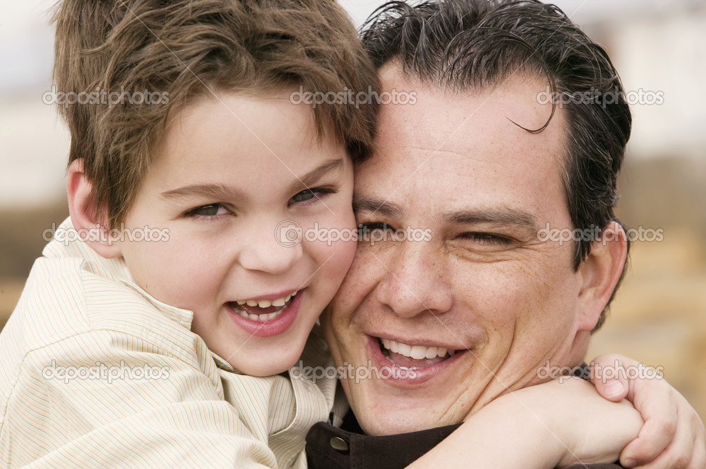 Boy Hugs Man Stock Photo by ©creatista 39450405