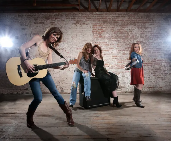 Female musicians Stock Photo by ©creatista 40175937