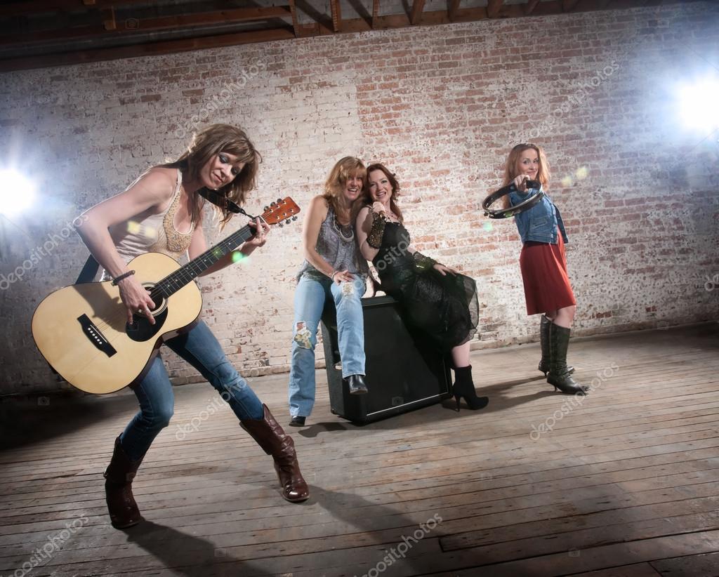 Female musicians Stock Photo by ©creatista 40175937