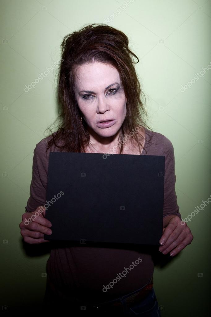 Woman taking mugshot — Stock Photo © creatista #40384085