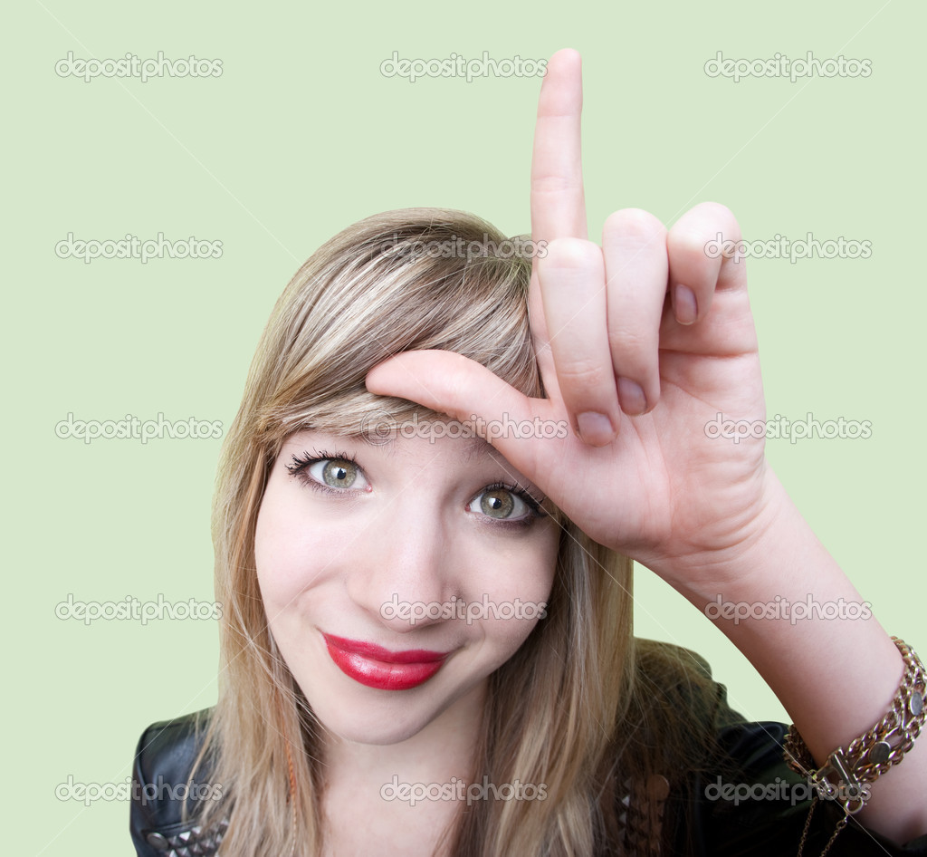 Lady Makes Loser Sign Stock Photo by ©creatista 40889705