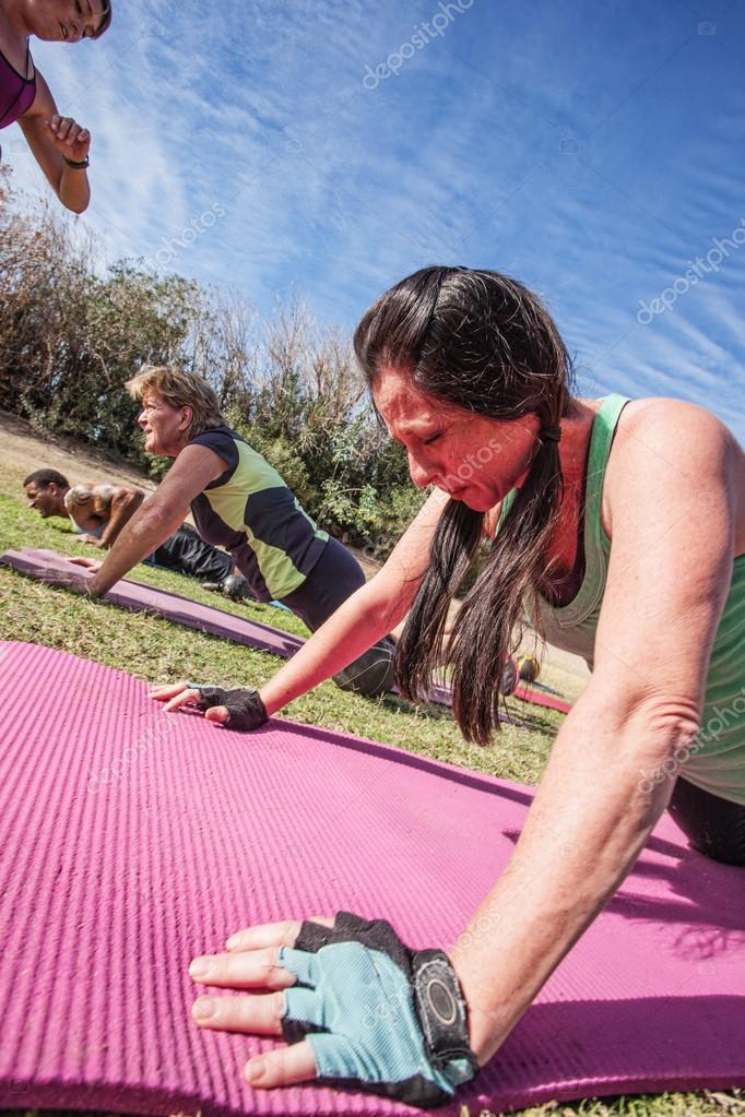 People Doing Push-Ups Stock Photo by ©creatista 41999991