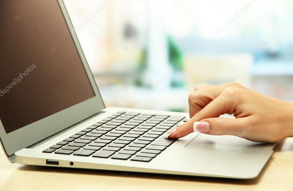 Female hand writing on laptot, close up — Stock Photo © belchonock ...