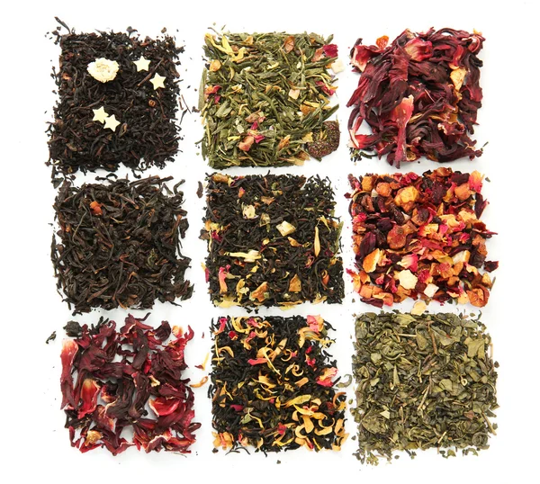 Assortment of dry tea, isolated on white — Stock Photo © belchonock ...