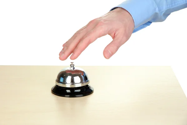Hand ringing in service bell on wooden table on black background Stock ...