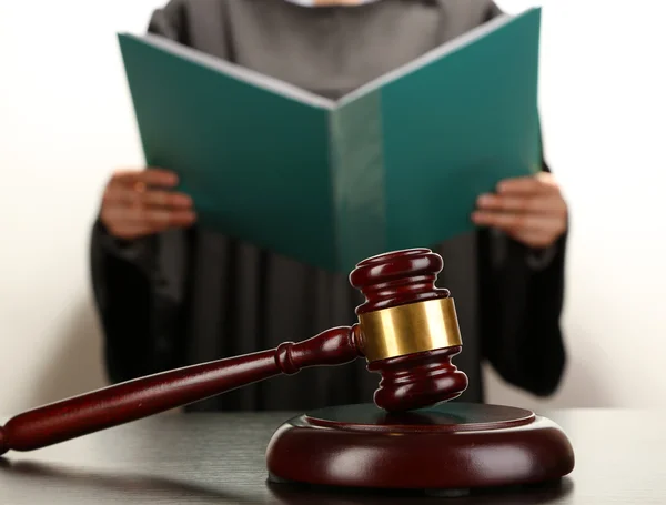 Judge read verdict on white background Stock Photo by ©belchonock 20325997