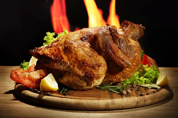 Roasting Chicken Over Fire