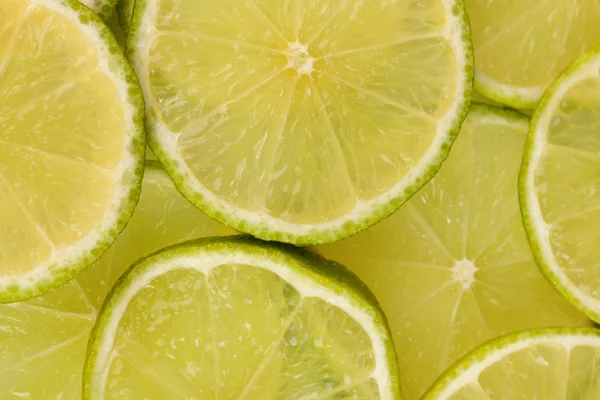 Lime slices background - Stock Image - Everypixel