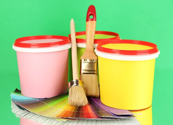 Set for painting: paint pots, brushes, palette of colors isolated on ...