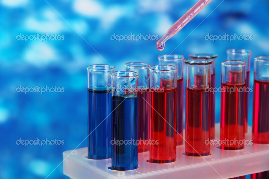 Blue and red test tubes close-up Stock Photo by ©belchonock 25325743