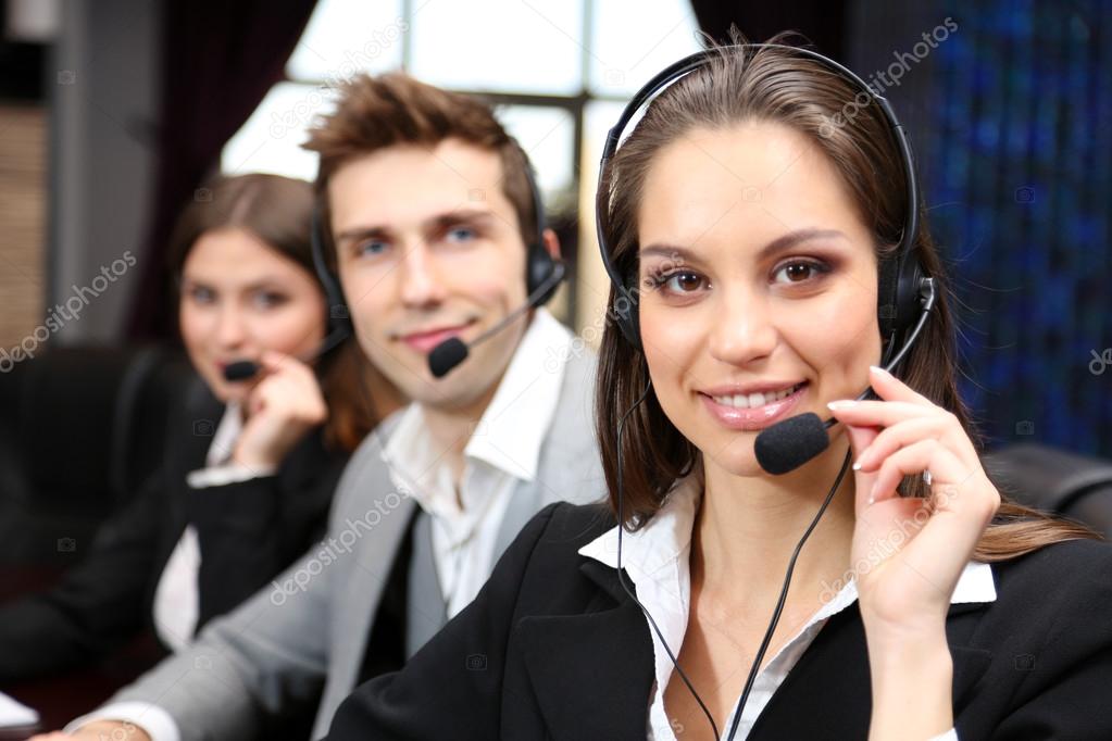 Call center operators at wor — Stock Photo © belchonock #25704809