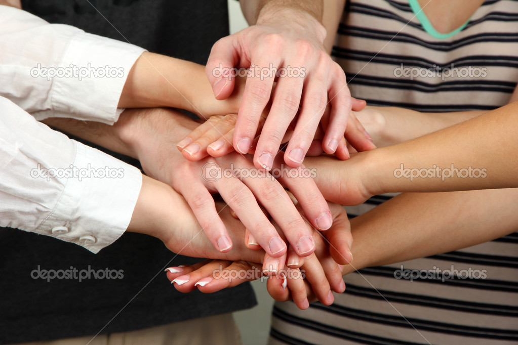 Group of young 's hands, close up — Stock Photo © belchonock #26153997