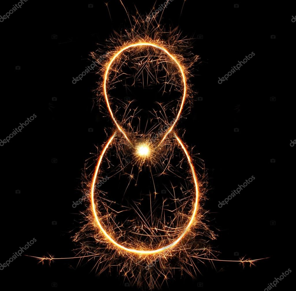 Number "eight" sparklers on black background Stock Photo by ©belchonock ...