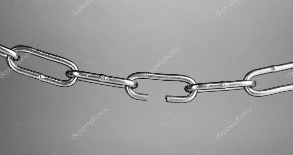 Broken chain on gray background Stock Photo by ©belchonock 27733991