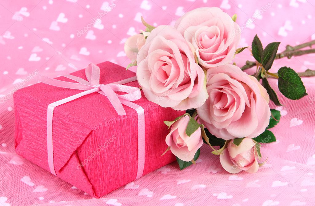 Romantic parcel on pink cloth background Stock Photo by ©belchonock ...