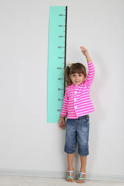Girl measure height Stock Photos, Royalty Free Girl measure height ...