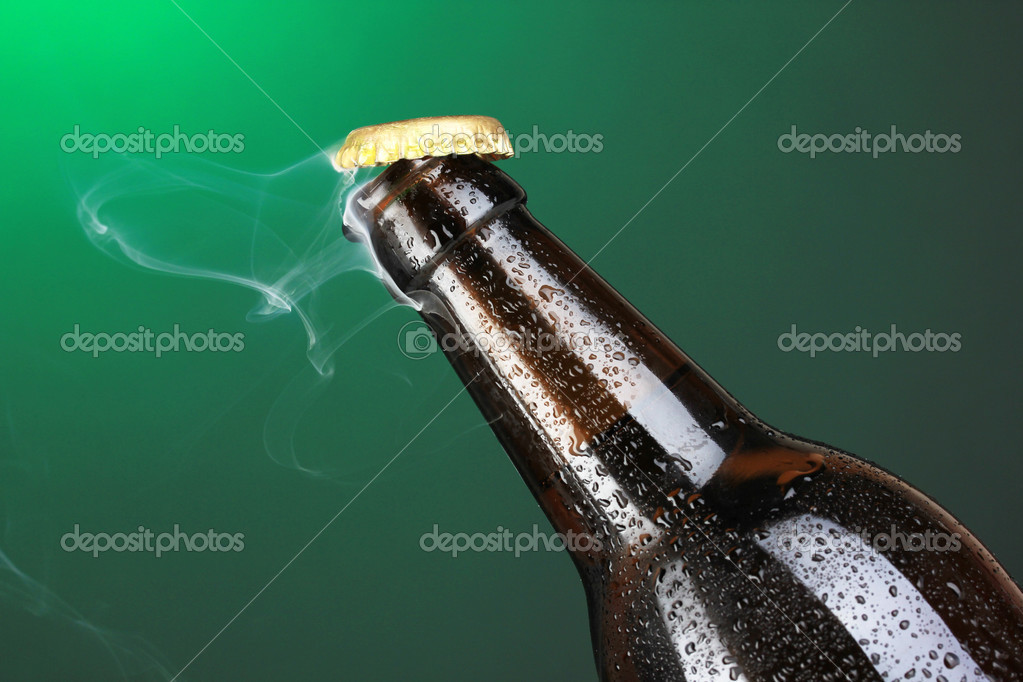 Top of open wet beer bottle on dark background Stock Photo by ...