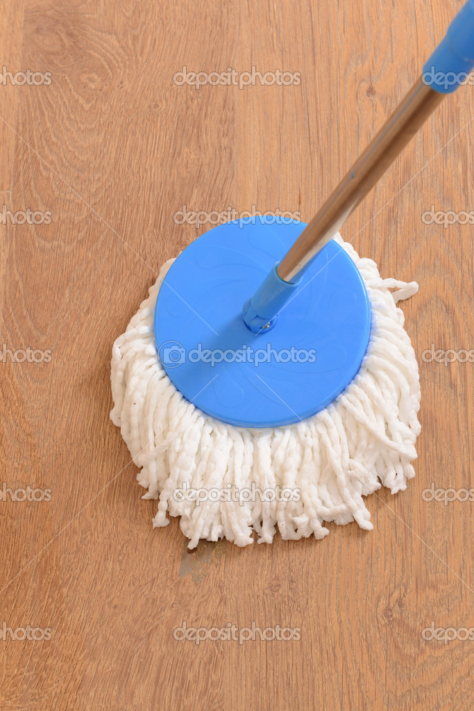 House cleaning with mop — Stock Photo © belchonock #34432021