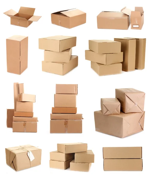Stacks of cardboard boxes isolated on white background — Stock Photo © photkas #22869726