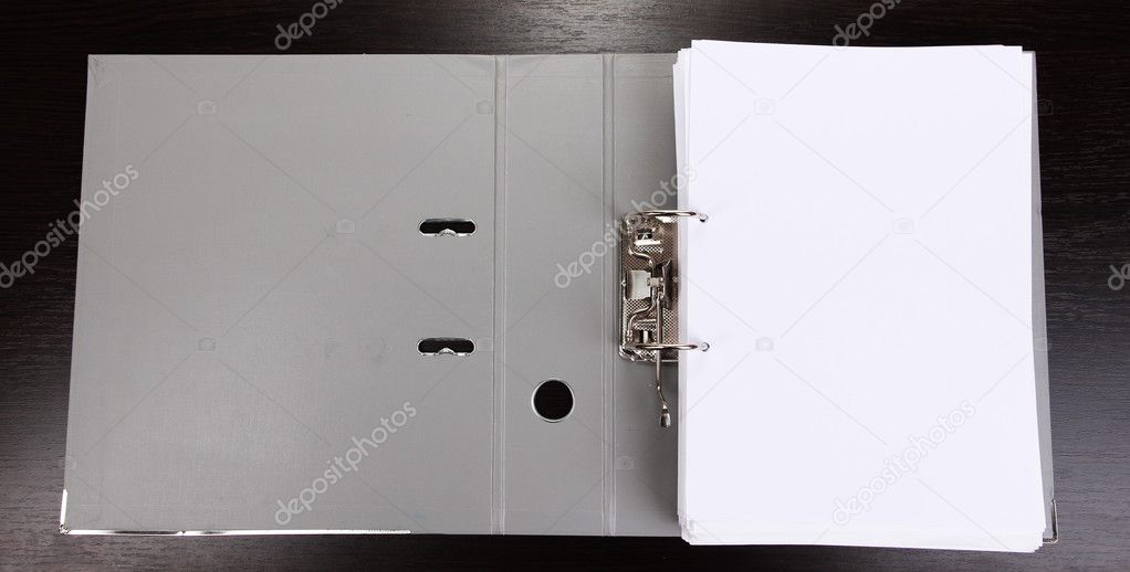 Open file folder on desk Stock Photo by ©belchonock 38813335