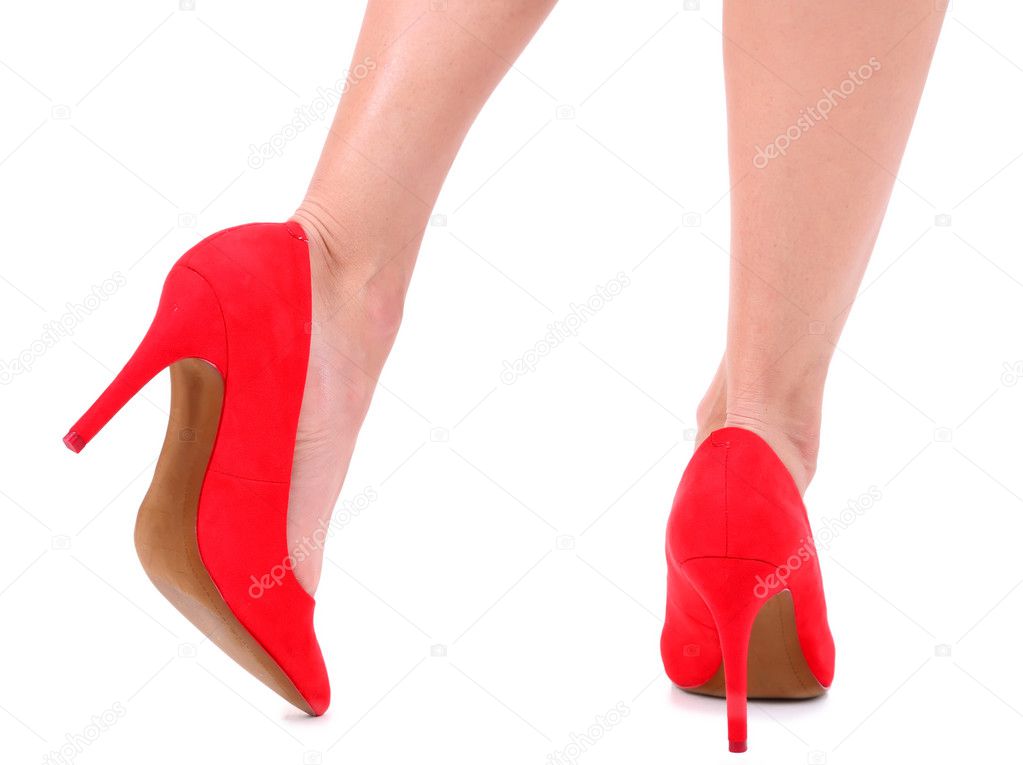 Beautiful female legs in red shoes isolated on white Stock Photo by ...