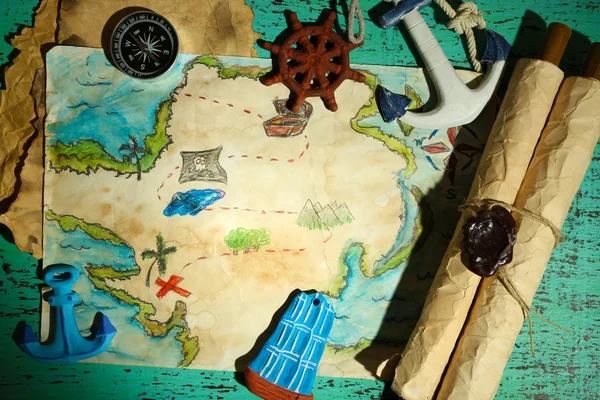 Treasure map with sea accessories, on wooden background Stock Photo by ...