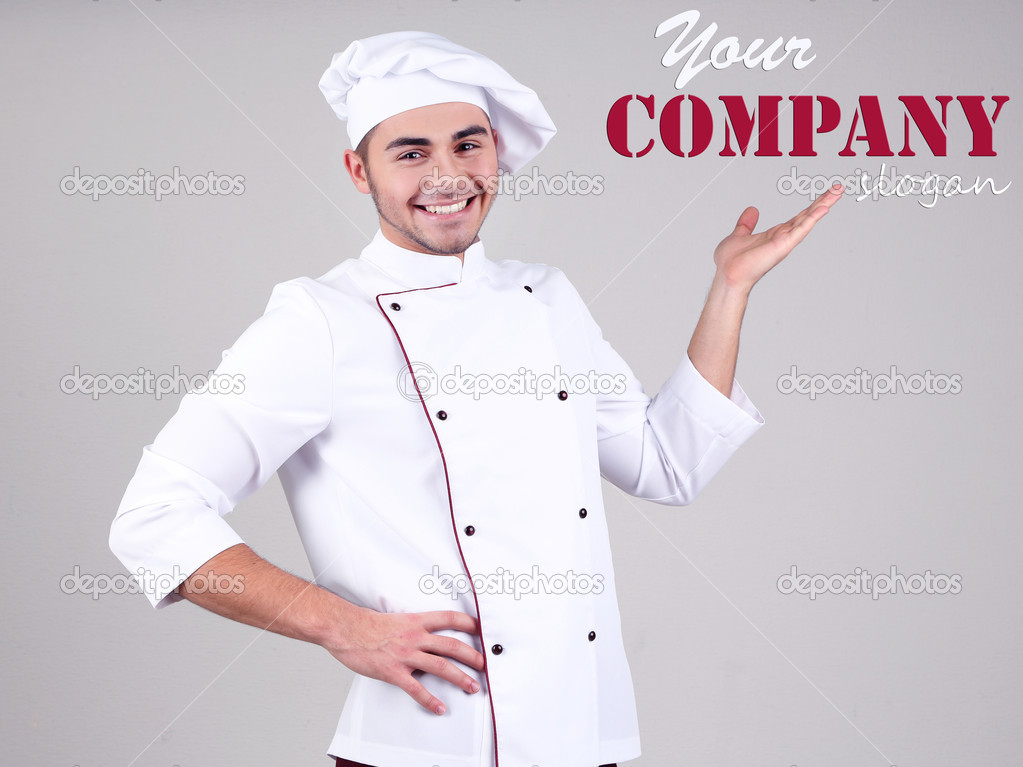 Professional chef in white uniform and hat, on gray background Stock ...