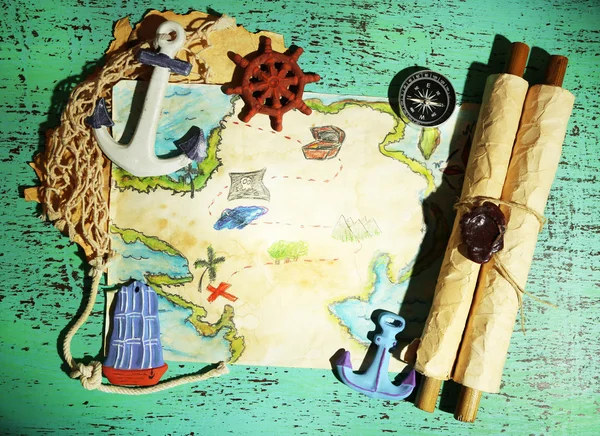 Treasure map with sea accessories, on wooden background - Stock Image ...