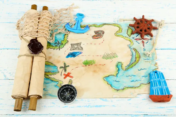 Treasure map with sea accessories, on wooden background Stock Photo by ...