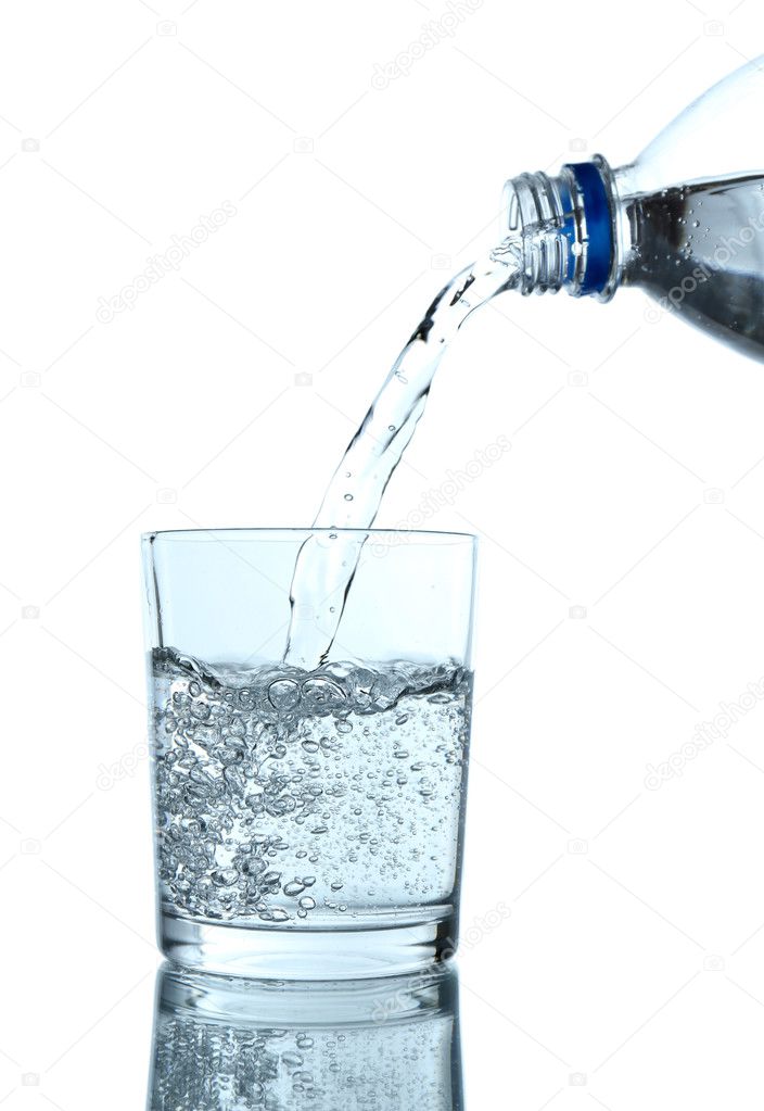 Pour water from bottle into glass, on light blue background — Stock ...