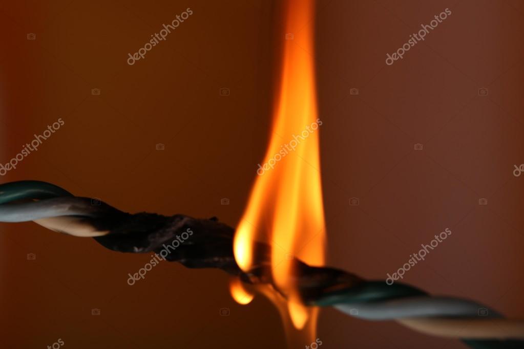 Short circuit, burnt cable, on dark color background ⬇ Stock Photo ...