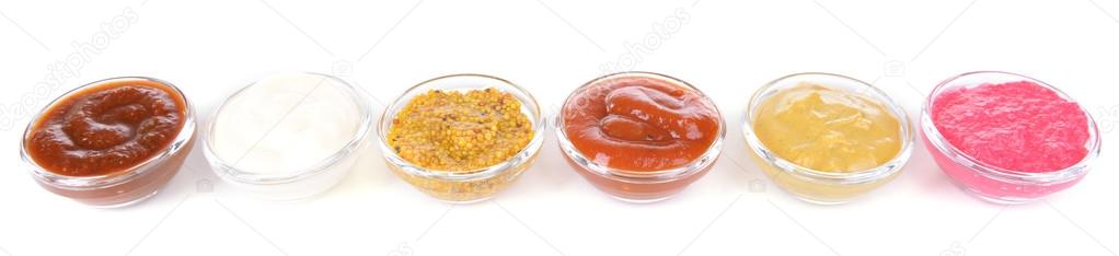 Various sauces isolated on white — Stock Photo © belchonock #41766801