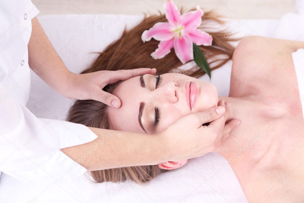 Beautiful Young Woman Having Head Massage In Spa Salon Close Up Stock