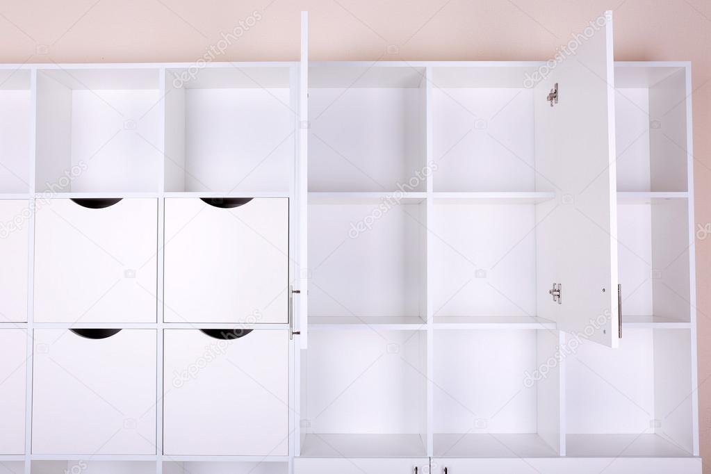 Empty white shelves close up Stock Photo by ©belchonock 44829833
