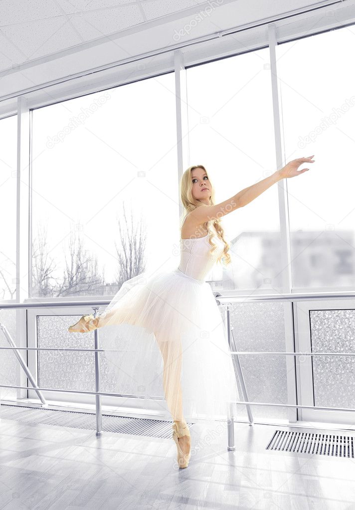 Beautiful balerina practicing in ballet class Stock Photo by ...