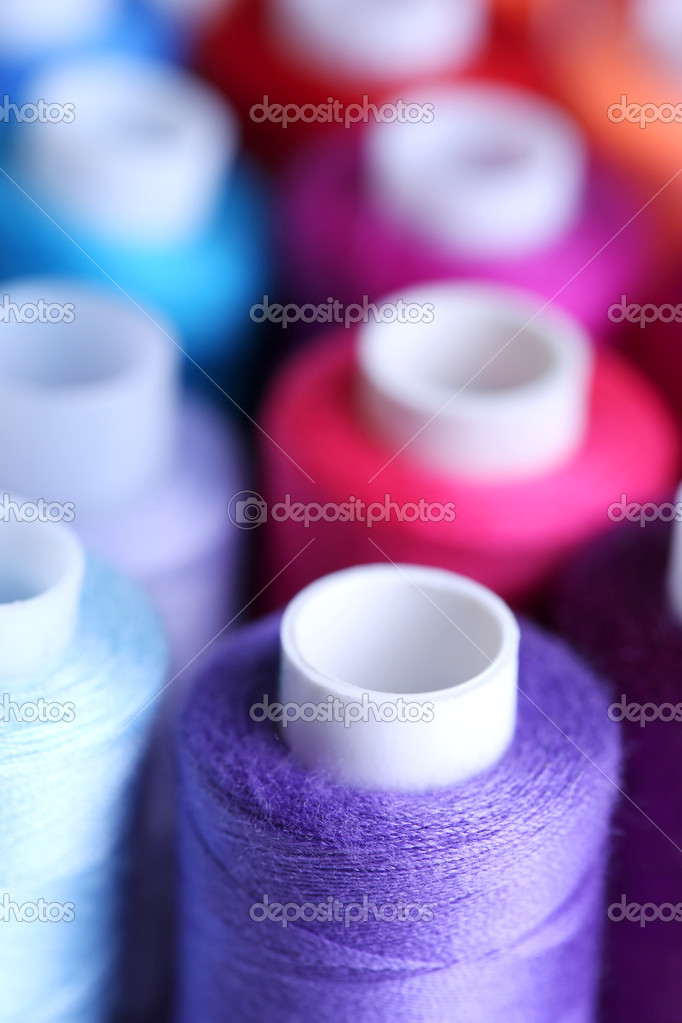Multicolor sewing threads background — Stock Photo © belchonock #47477083
