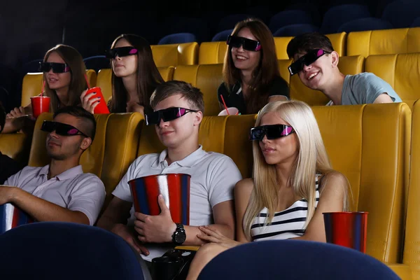 Young people watching movie in cinema - Stock Image - Everypixel