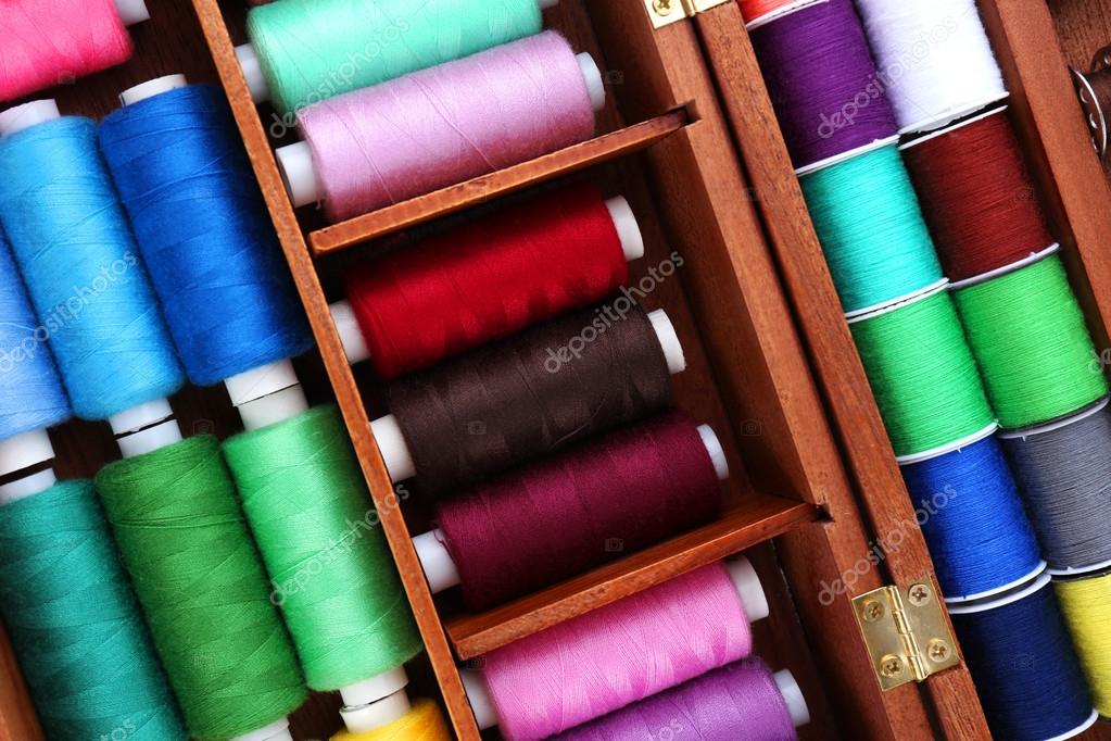 Colorful threads for needlework — Stock Photo © belchonock #49529295