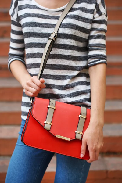 Girl with bag over his shoulder outdoors — Stock Photo © belchonock ...