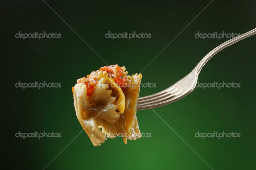 Italian pasta on fork Stock Photo by ©belchonock 50446517