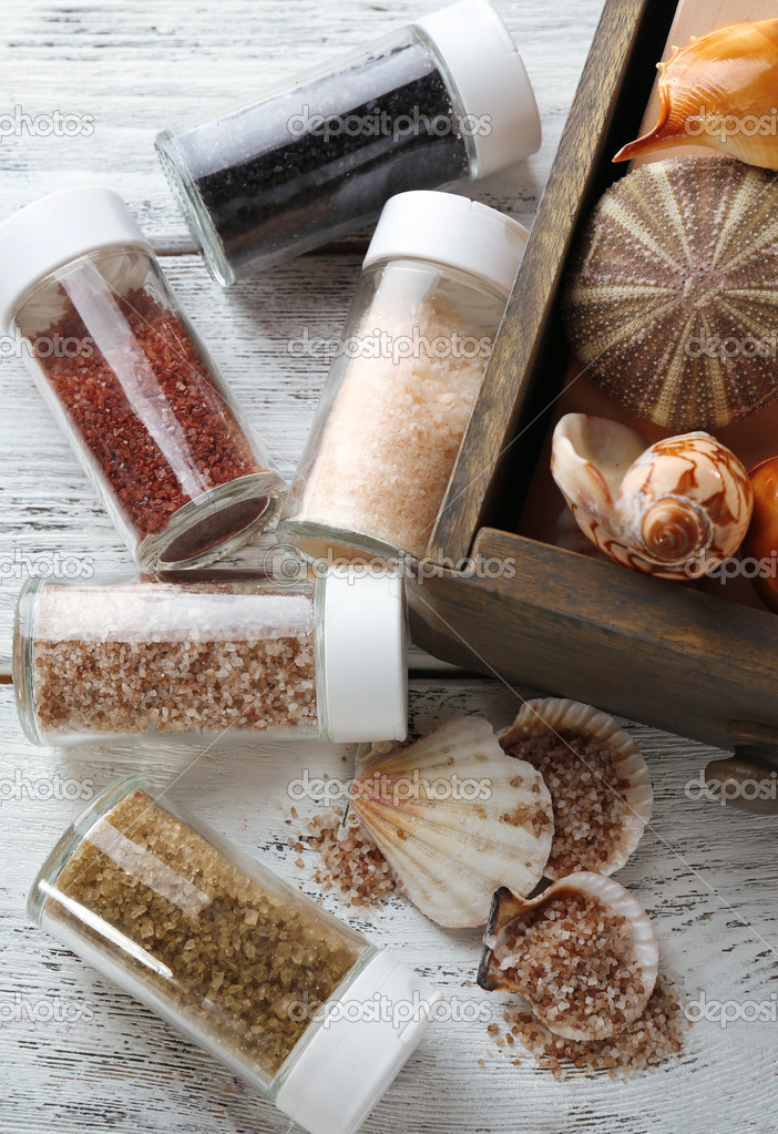 Different sea salt in bottles — Stock Photo © belchonock #51273393