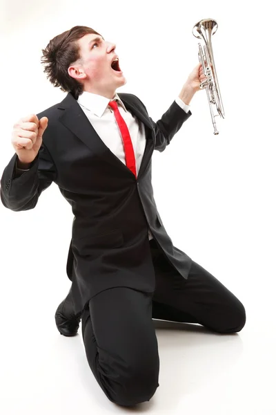 young man joy, glee and his Trumpet - Stock Image - Everypixel