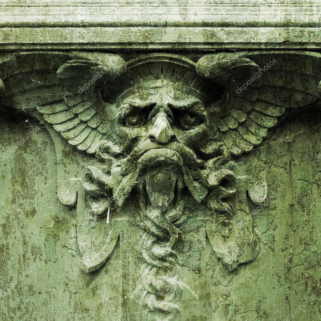 Devil on a gate — Stock Photo © Aninka #40377923