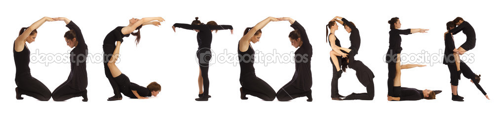 Black dressed people forming OCTOBER word over white — Stock Photo ...