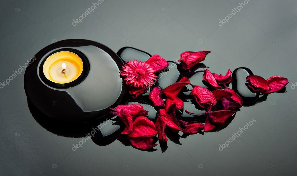 Spa background. red petals, stones black and candle Stock Photo by ...